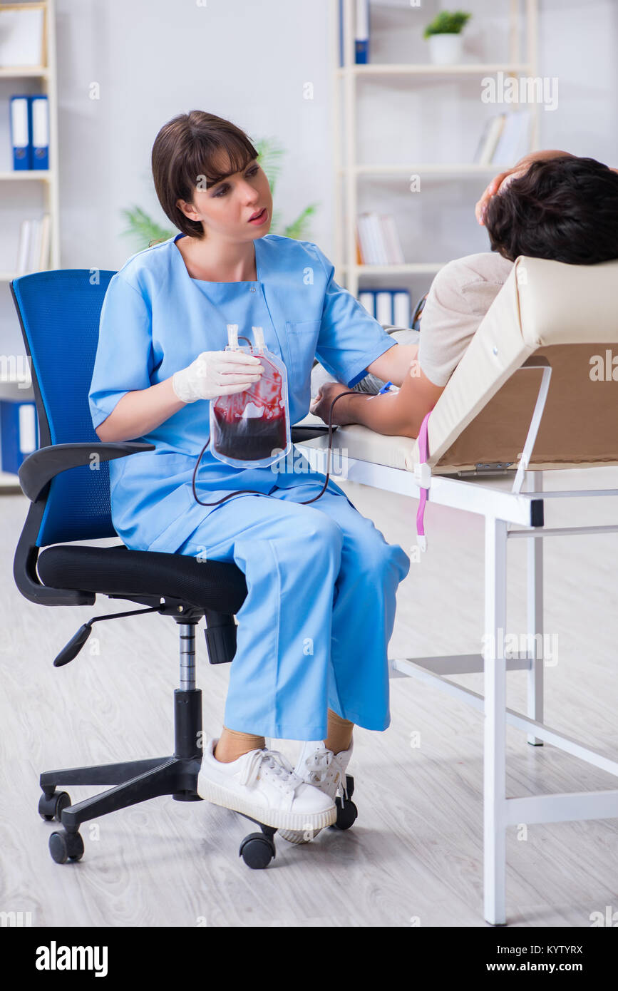 Patient getting blood transfusion in hospital clinic Stock Photo - Alamy