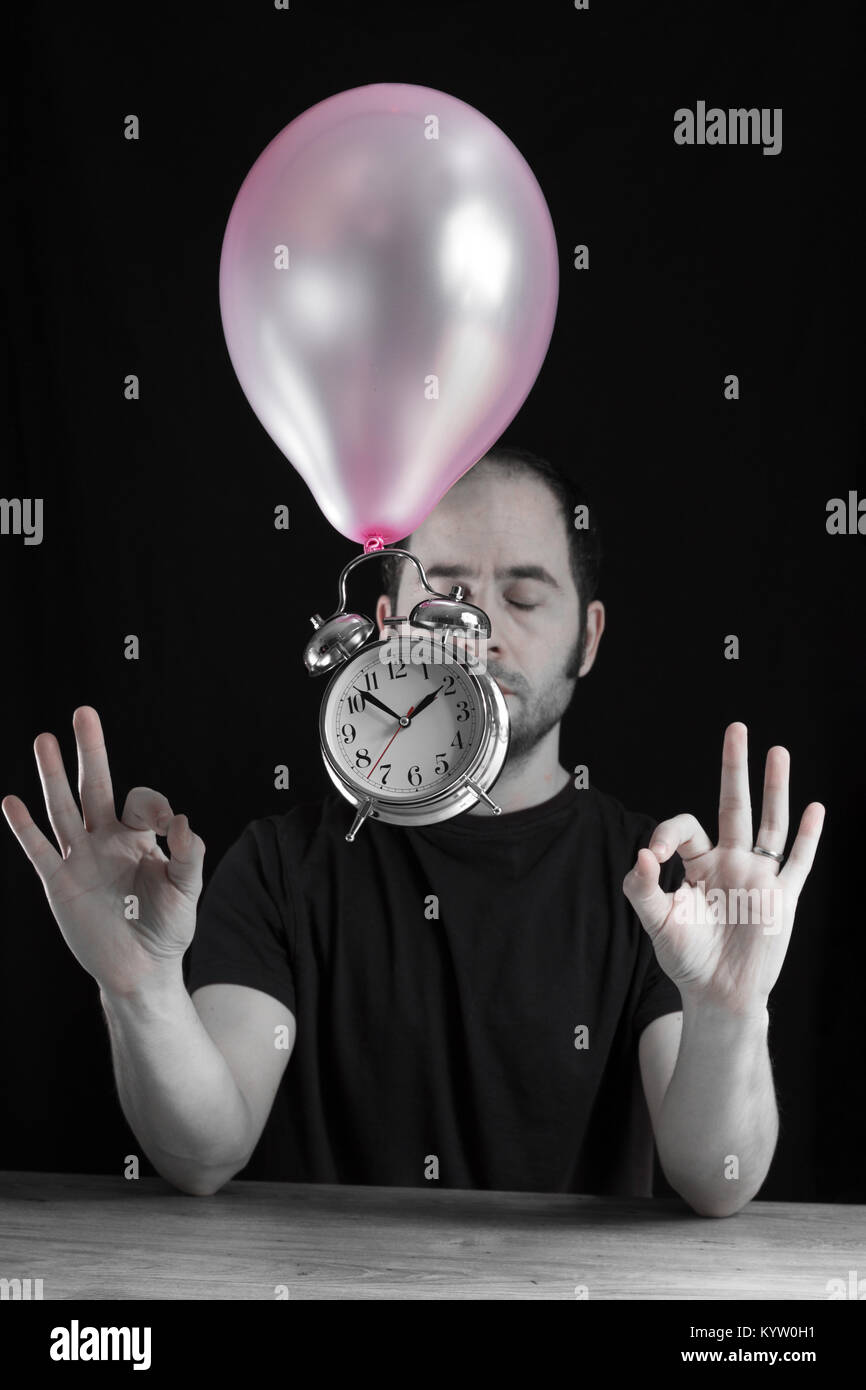 Time stands still concept - picture of a man with his eyes closed in a ...