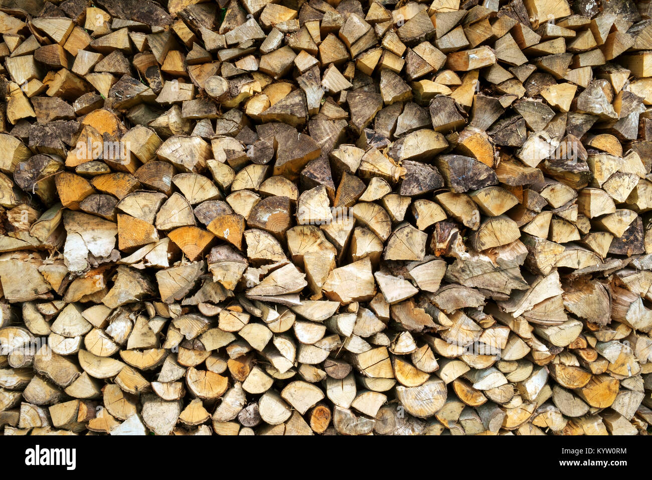 Carefully stacked tidy full frame split log pile background texture ...