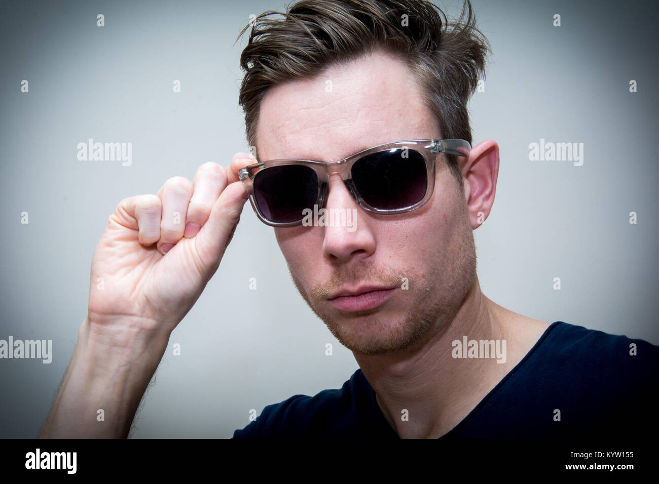 Man wear shades on white background Stock Photo - Alamy