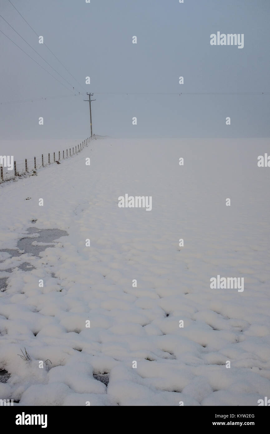 Empty fields scottish highlands during snow and mist Stock Photo - Alamy