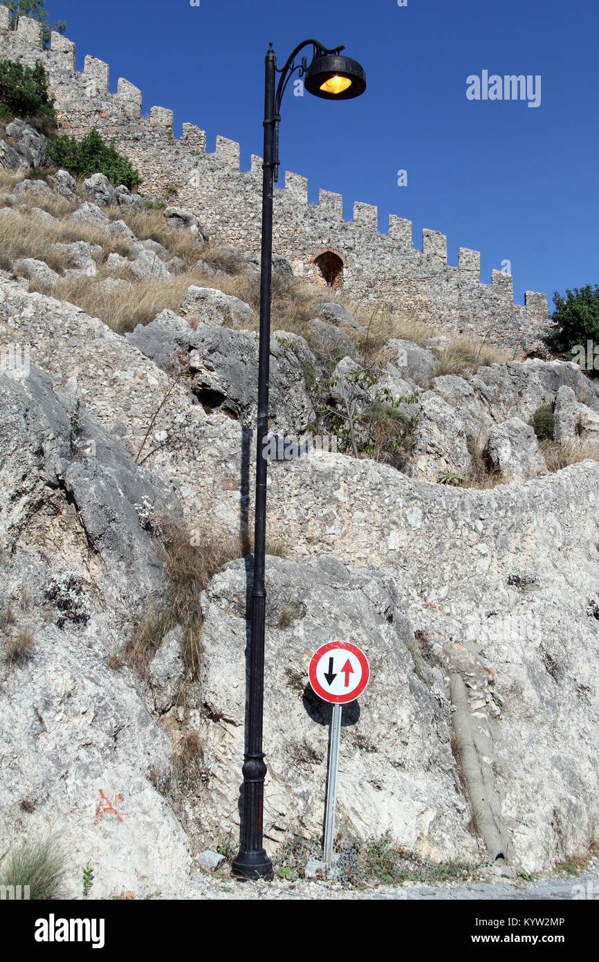 Street light and wall of fortress in Alanya, Turkey Stock Photo - Alamy