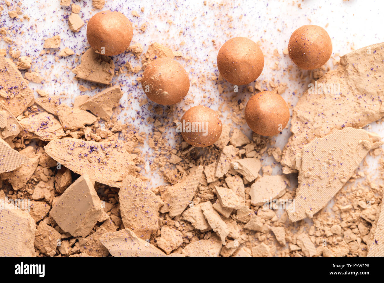 top view of crushed cosmetic powder on white tabletop Stock Photo - Alamy