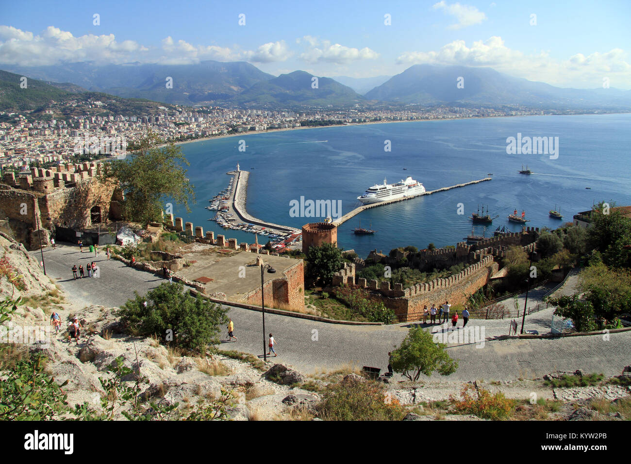 Road, wall and view of port Alanya, Turkey Stock Photo - Alamy