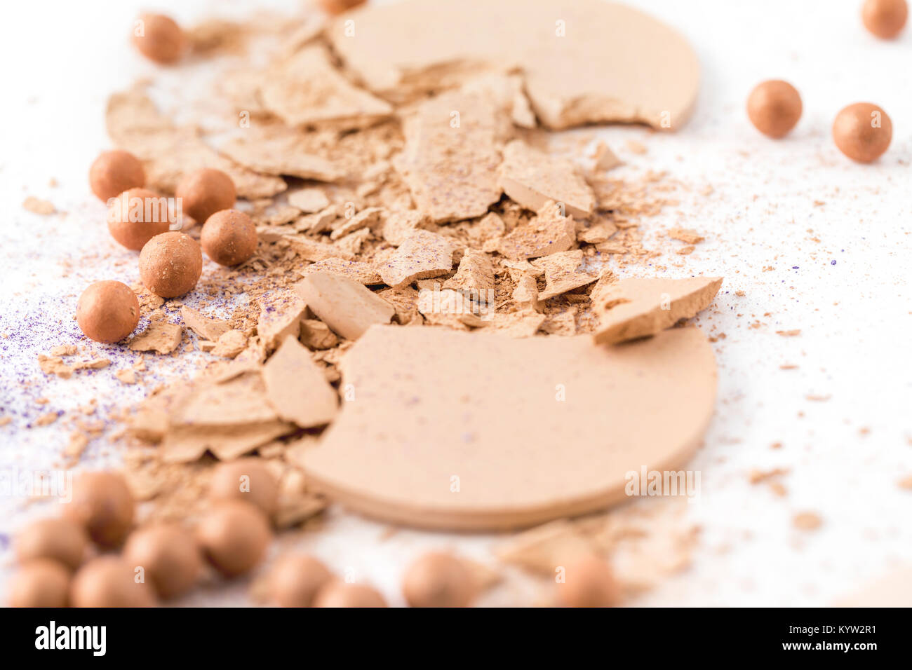 close-up shot of spilled cosmetic powder on white surface Stock Photo ...