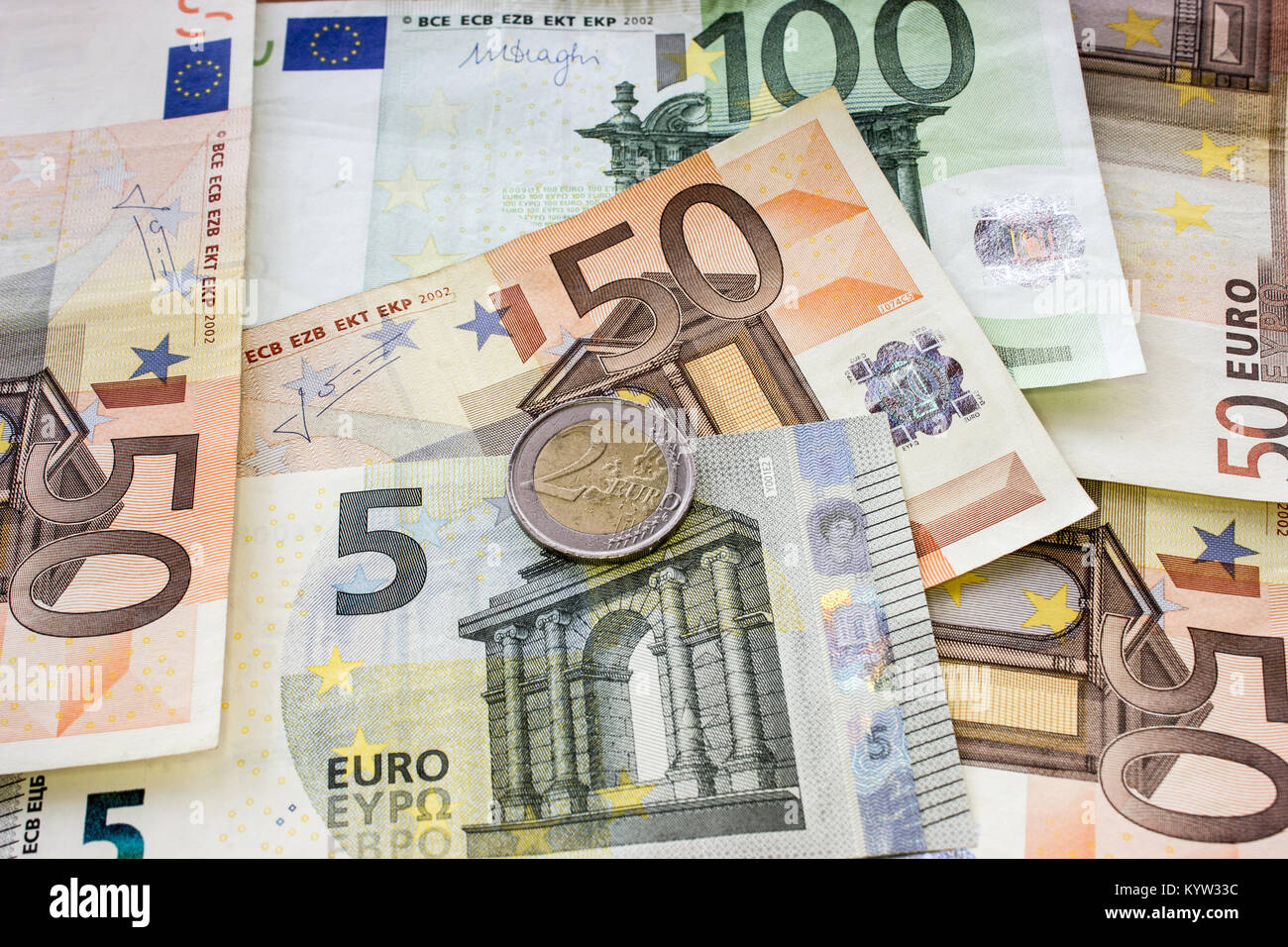 European coins on the various Euro banknotes like background Stock ...