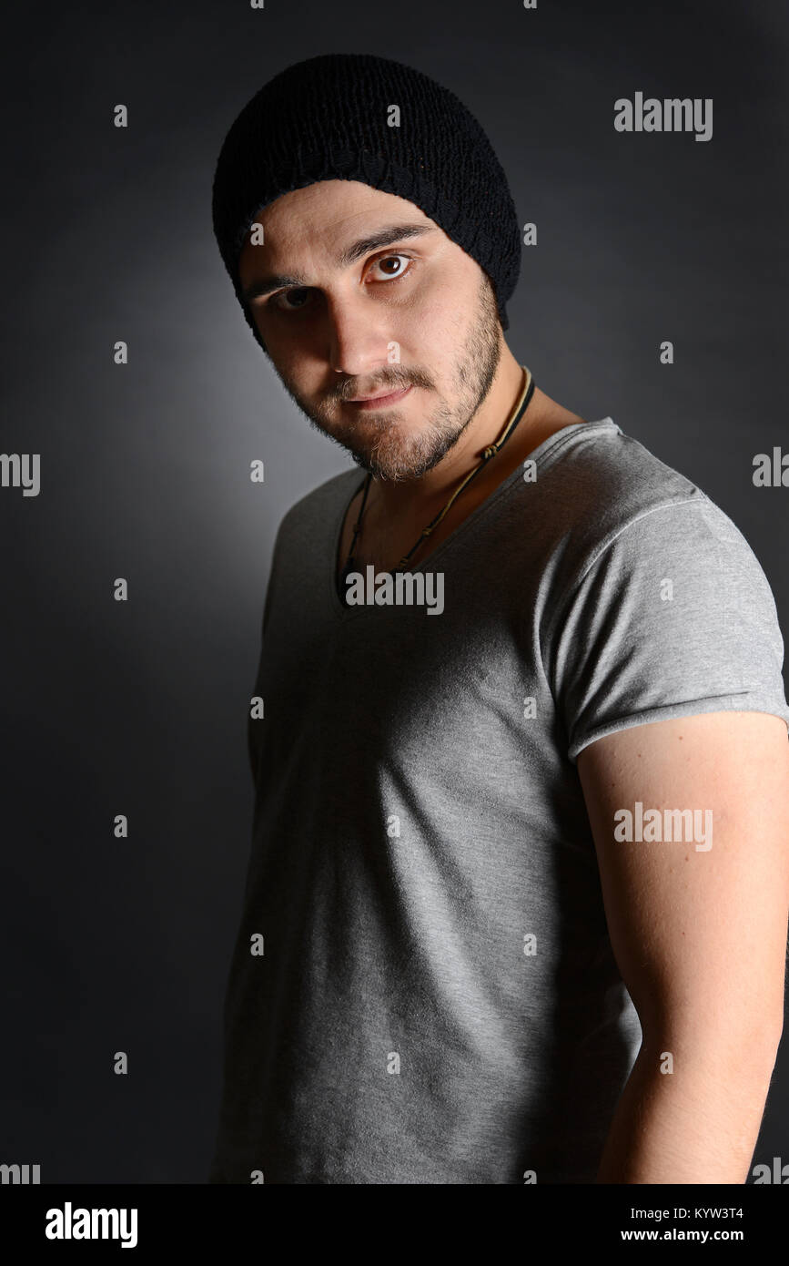 Rocker series. A man in leather jacket portrait black background Stock ...