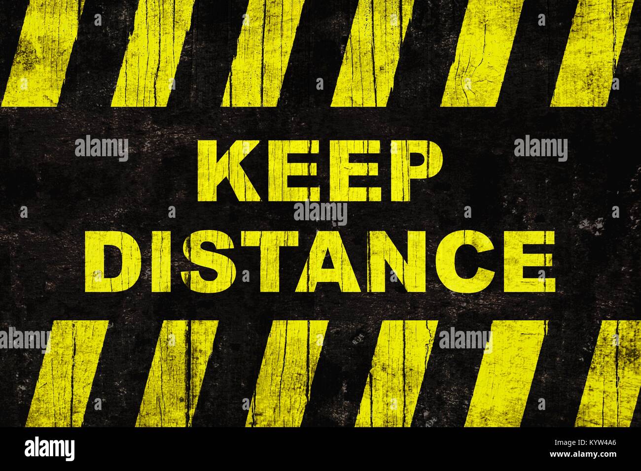 Grungy "keep distance" text warning sign with yellow and black stripes ...