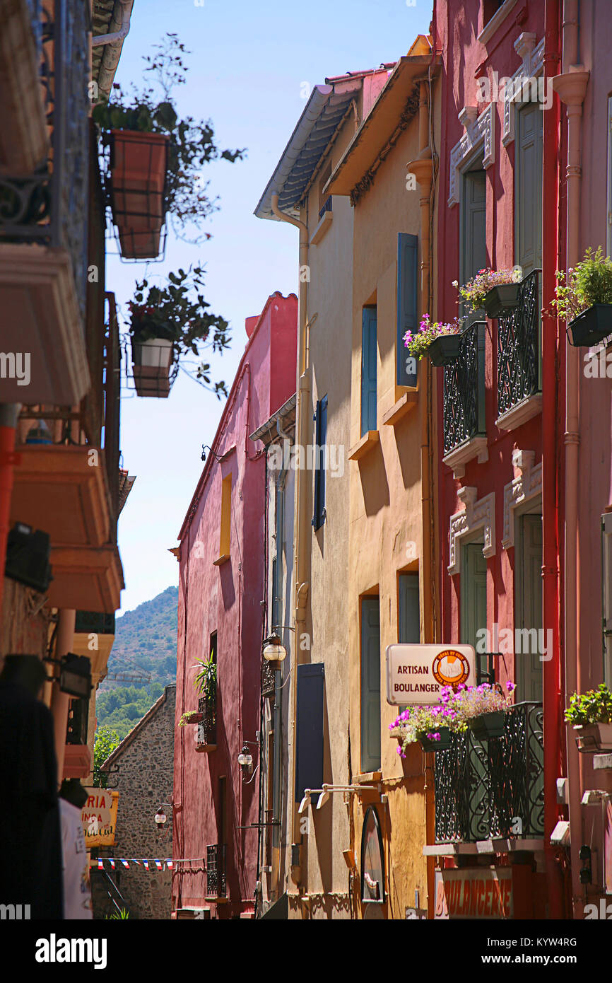Colourful narrow street in Collioure, Pyrenees-Orientales, Occitanie ...