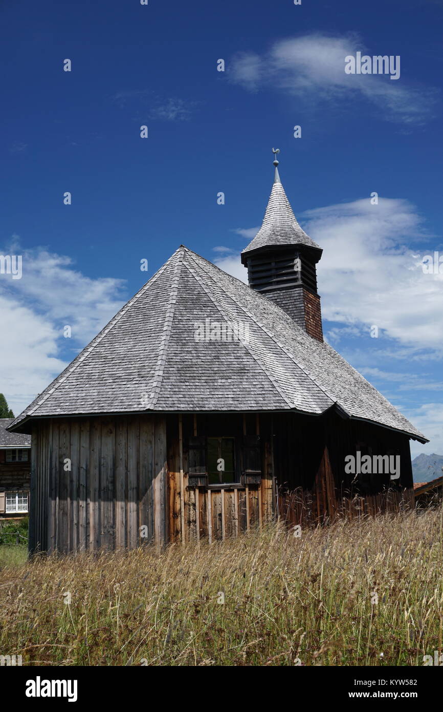 Alpine village church tower hi-res stock photography and images - Alamy