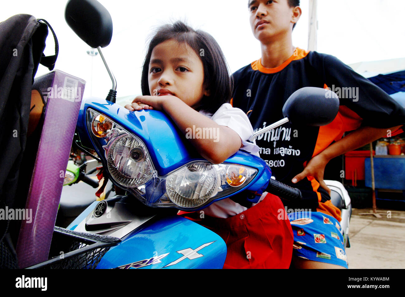 Brother and sister on a motorbike - Cha-Am - Thailand Stock Photo - Alamy