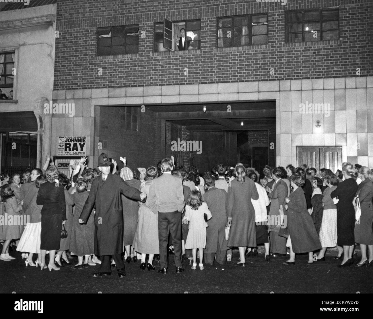 JOHNNIE RAY (1927-1990) American pop singer waves to fans at the ...