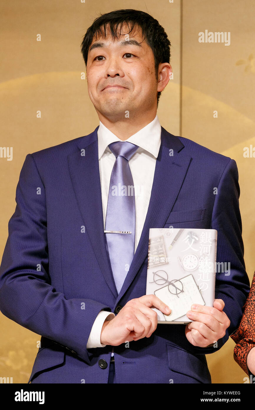 The 158th Naoki Prize winner Yoshinobu Kadoi poses for the cameras ...