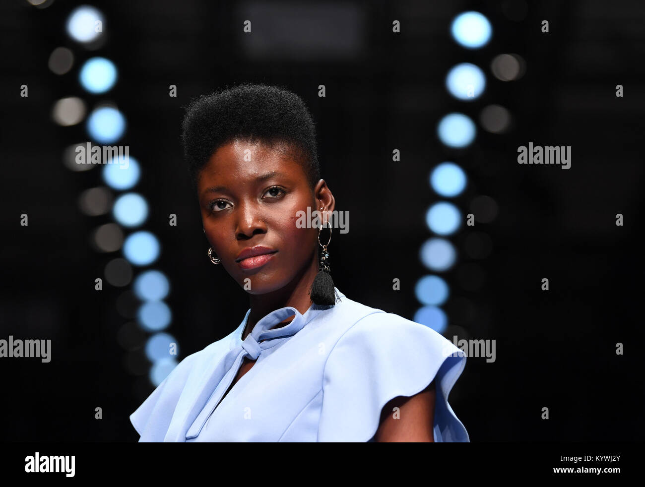Berlin, Germany. 16th Jan, 2018. A model presents a creation by the ...