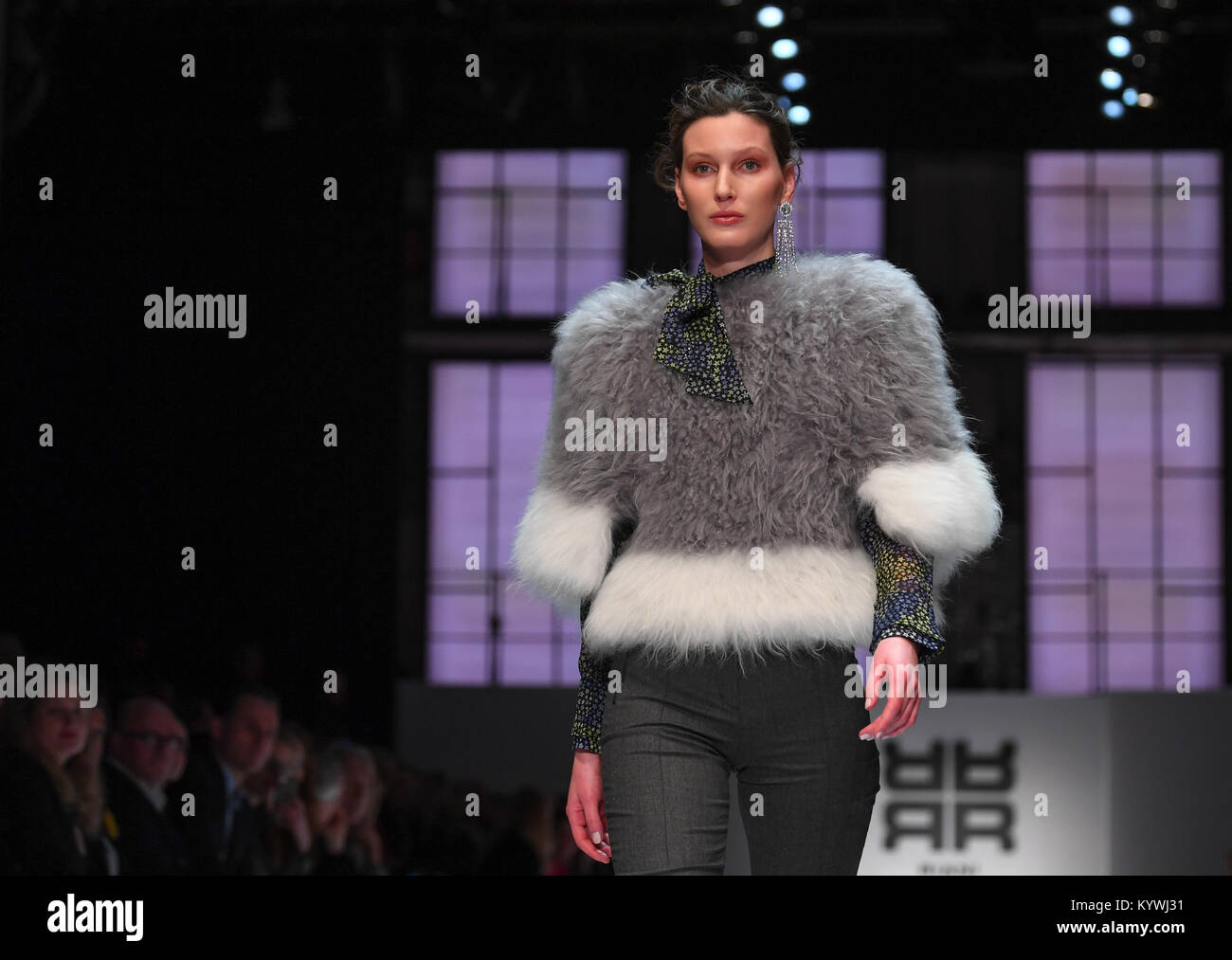 Berlin, Germany. 16th Jan, 2018. A model presents a creation by the ...