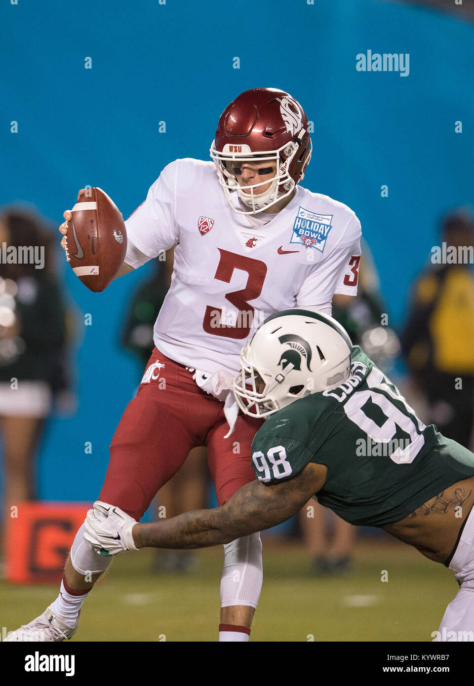 San Diego, CA. 28th Dec, 2017. Washington State quarterback (3) Tyler ...