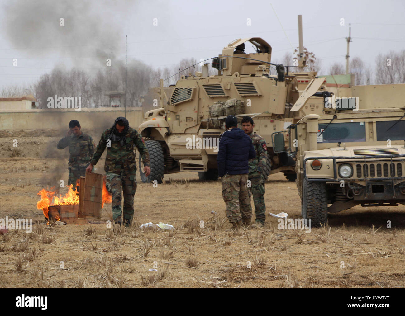 Kunduz, Afghanistan. 16th Jan, 2018. Afghan security force members take ...