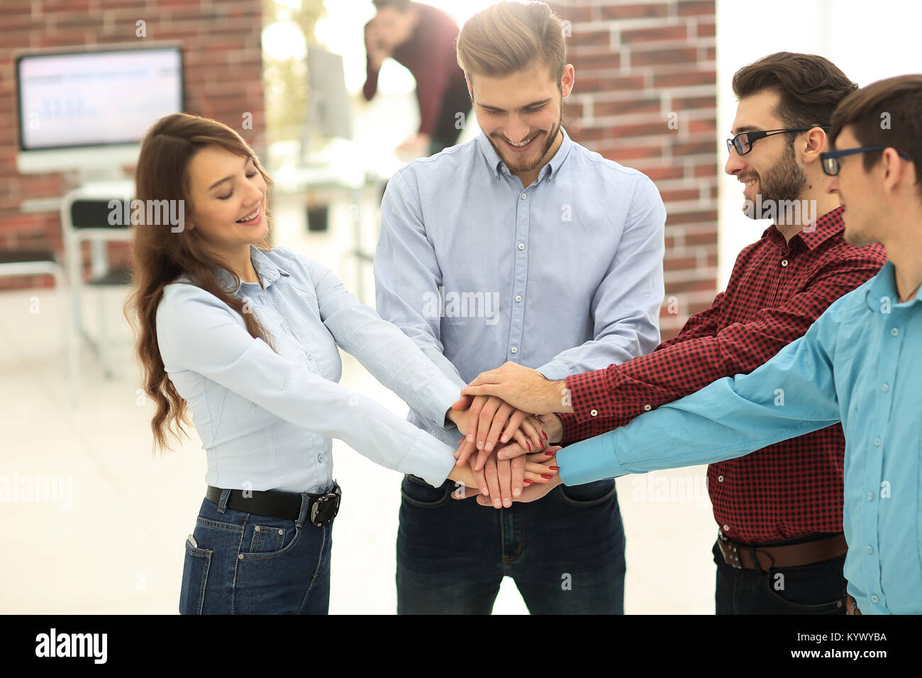 Group of people hands together partnership teamwork Stock Photo - Alamy