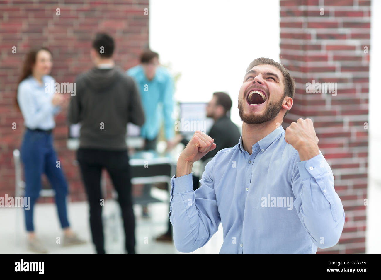 Handsome businessman celebrating victory shouting happily in th Stock ...