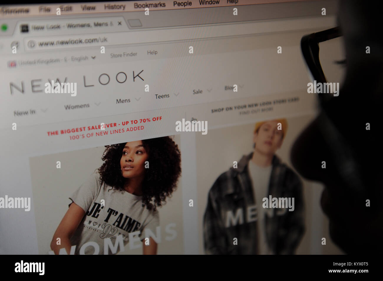 A woman looks at the New Look Stock Photo - Alamy