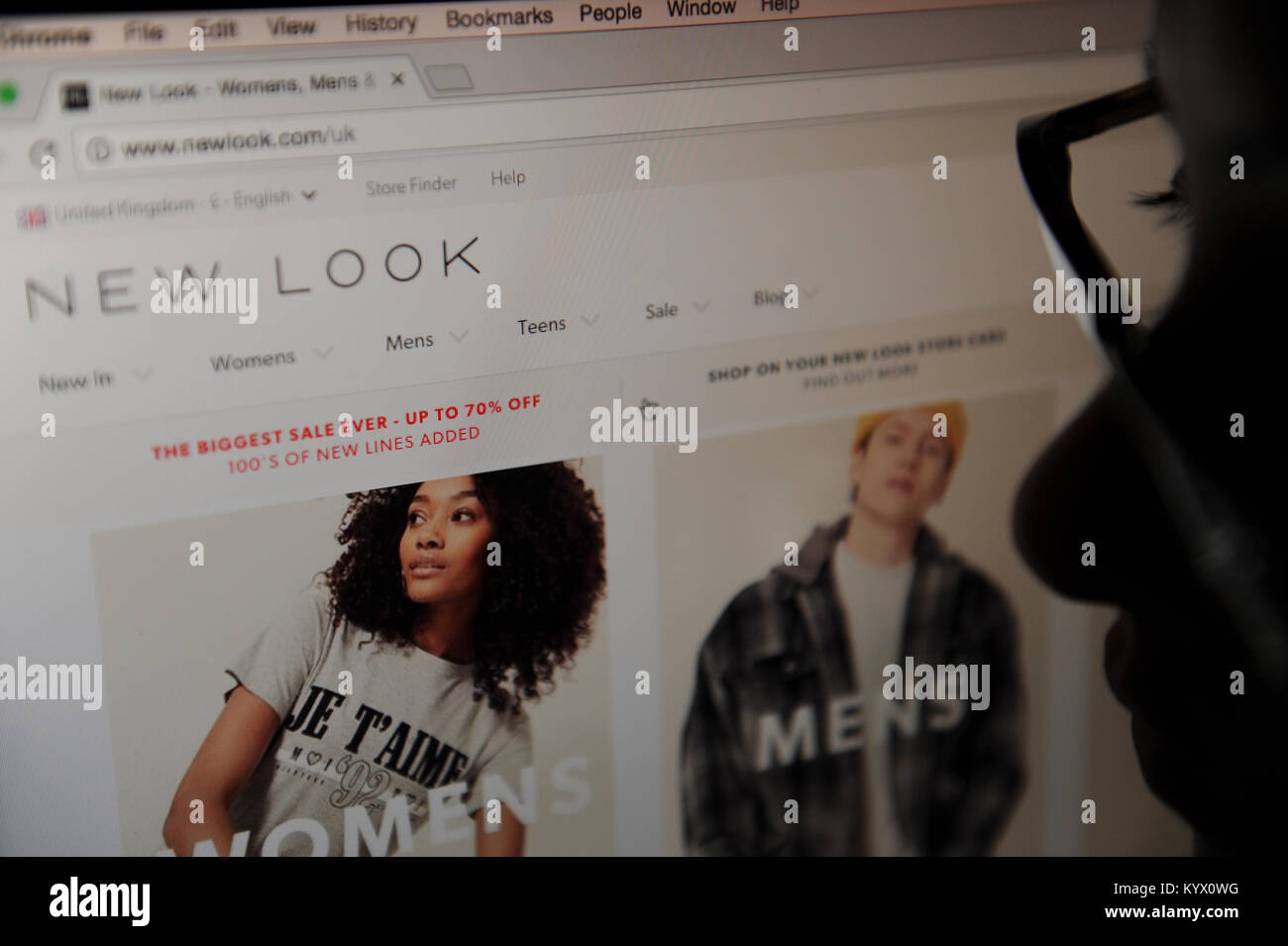 A woman looks at the New Look Stock Photo - Alamy