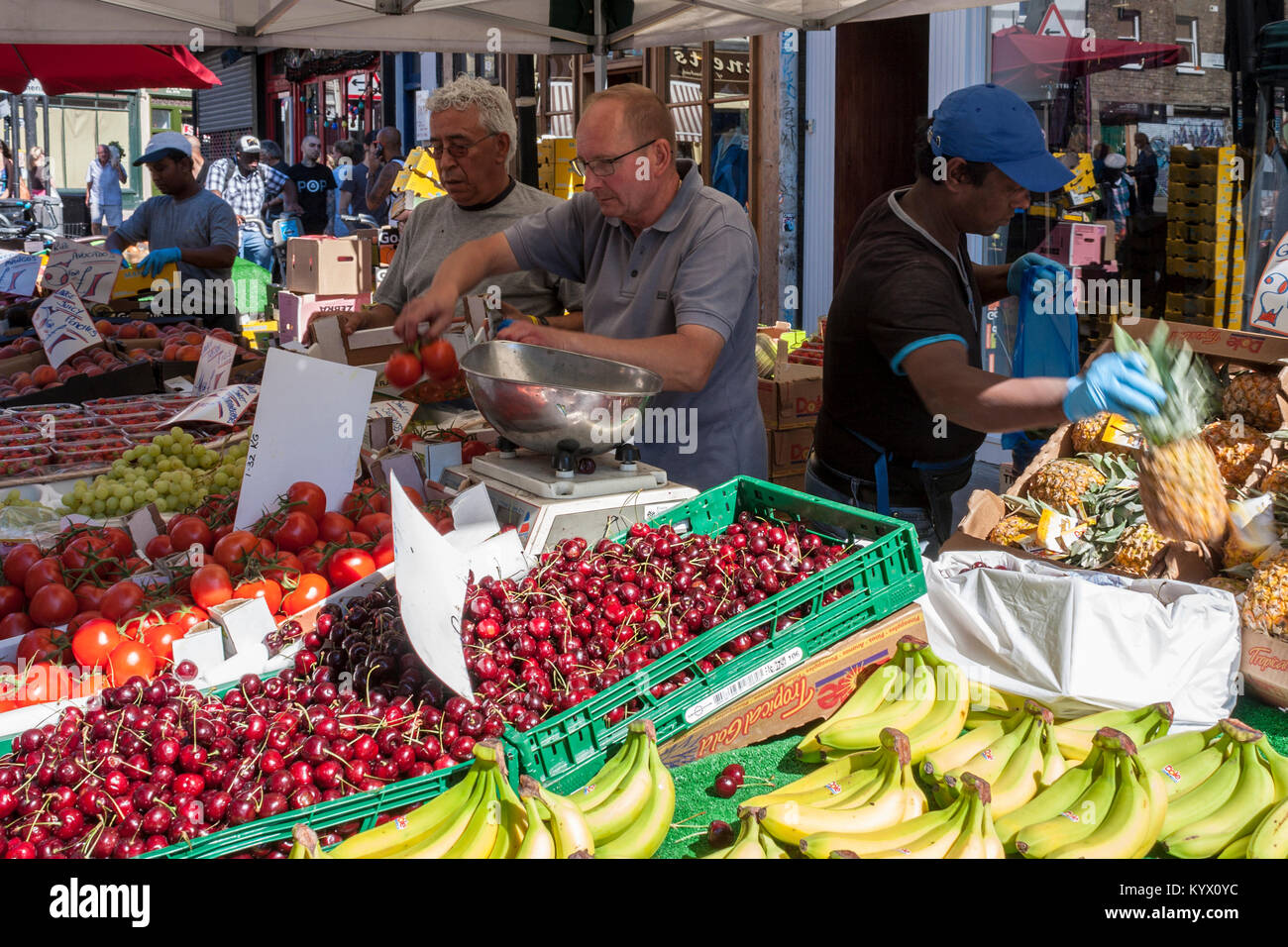 Brick Lane Market market traders on a fruit stall. Brick Lane, East ...