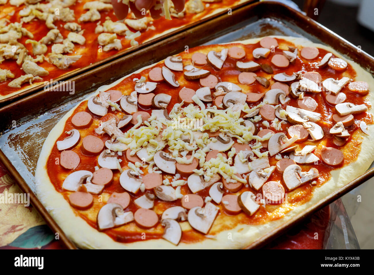 The process of making a pizza cooking Stock Photo - Alamy