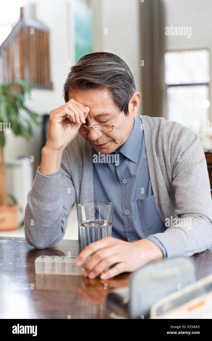 A sick old man Stock Photo - Alamy