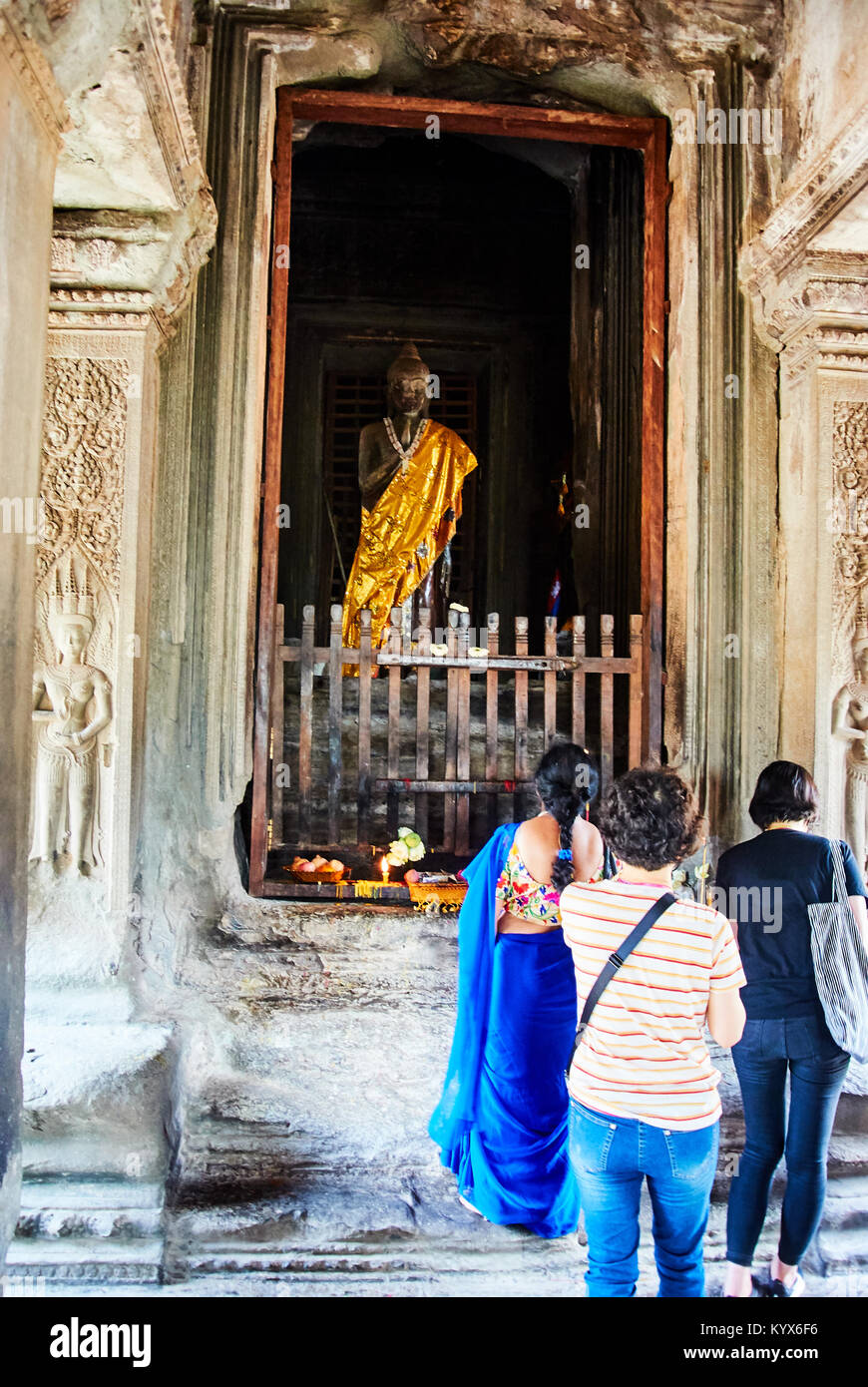 Historic building in Angkor wat Thom Cambodia with devatas carvings ...