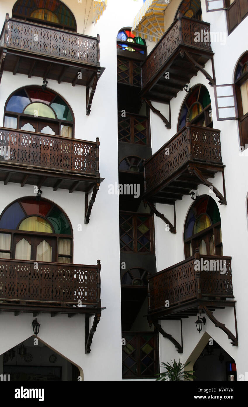 Apartment building balconies with stained glass, Stone Town, Zanzibar ...
