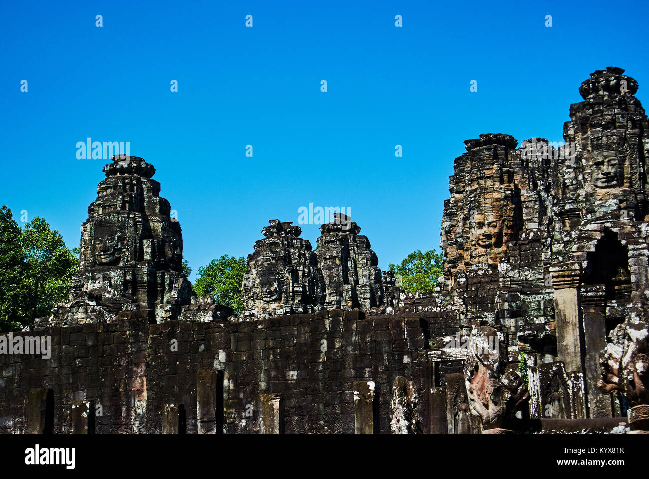Historic building in Angkor wat Thom Cambodia with devatas carvings ...