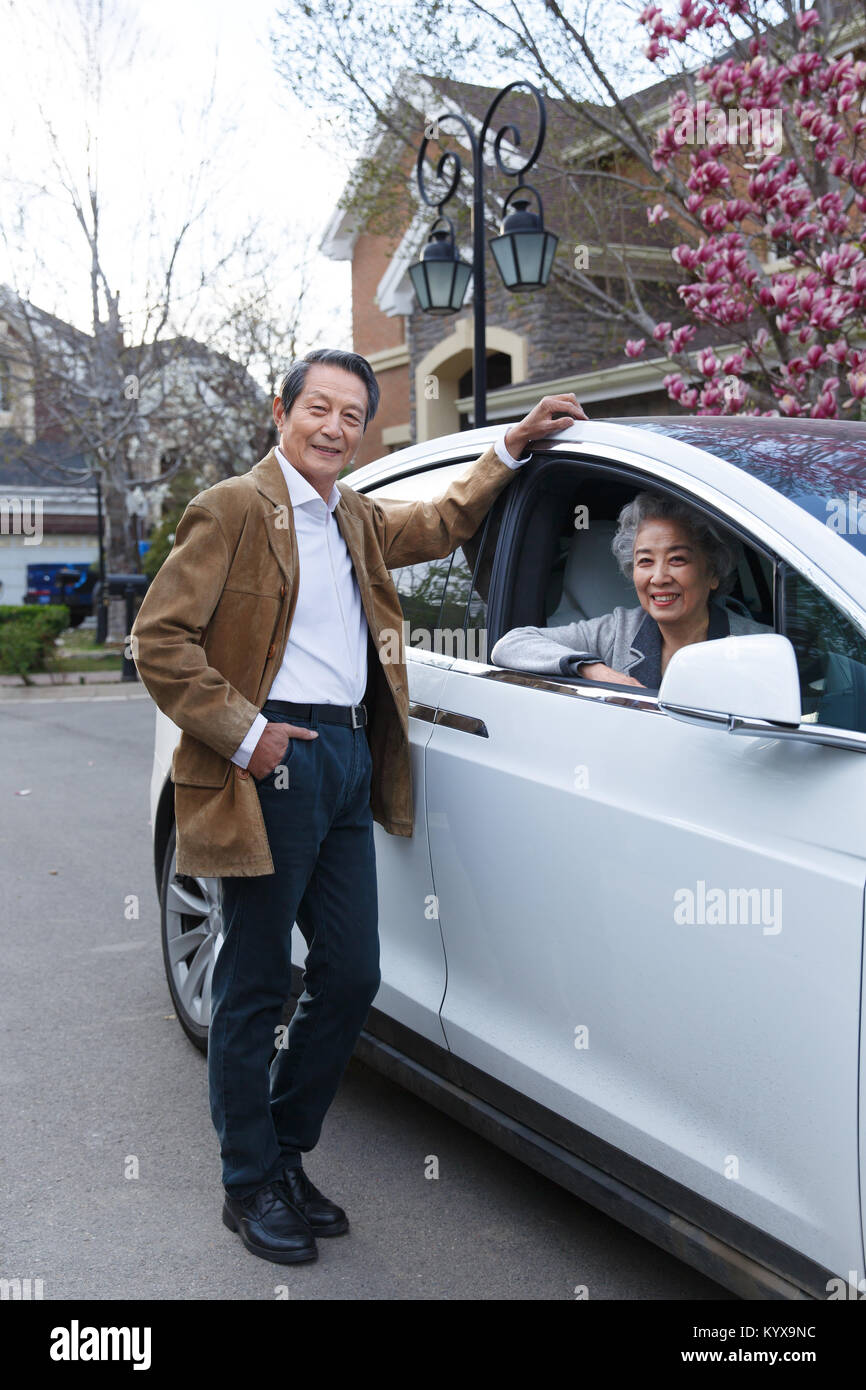 Old couple driving Stock Photo - Alamy