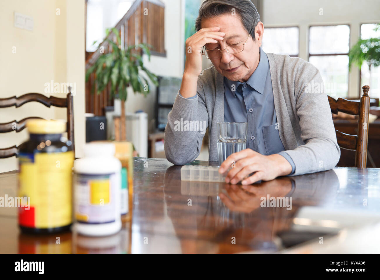 A sick old man Stock Photo - Alamy