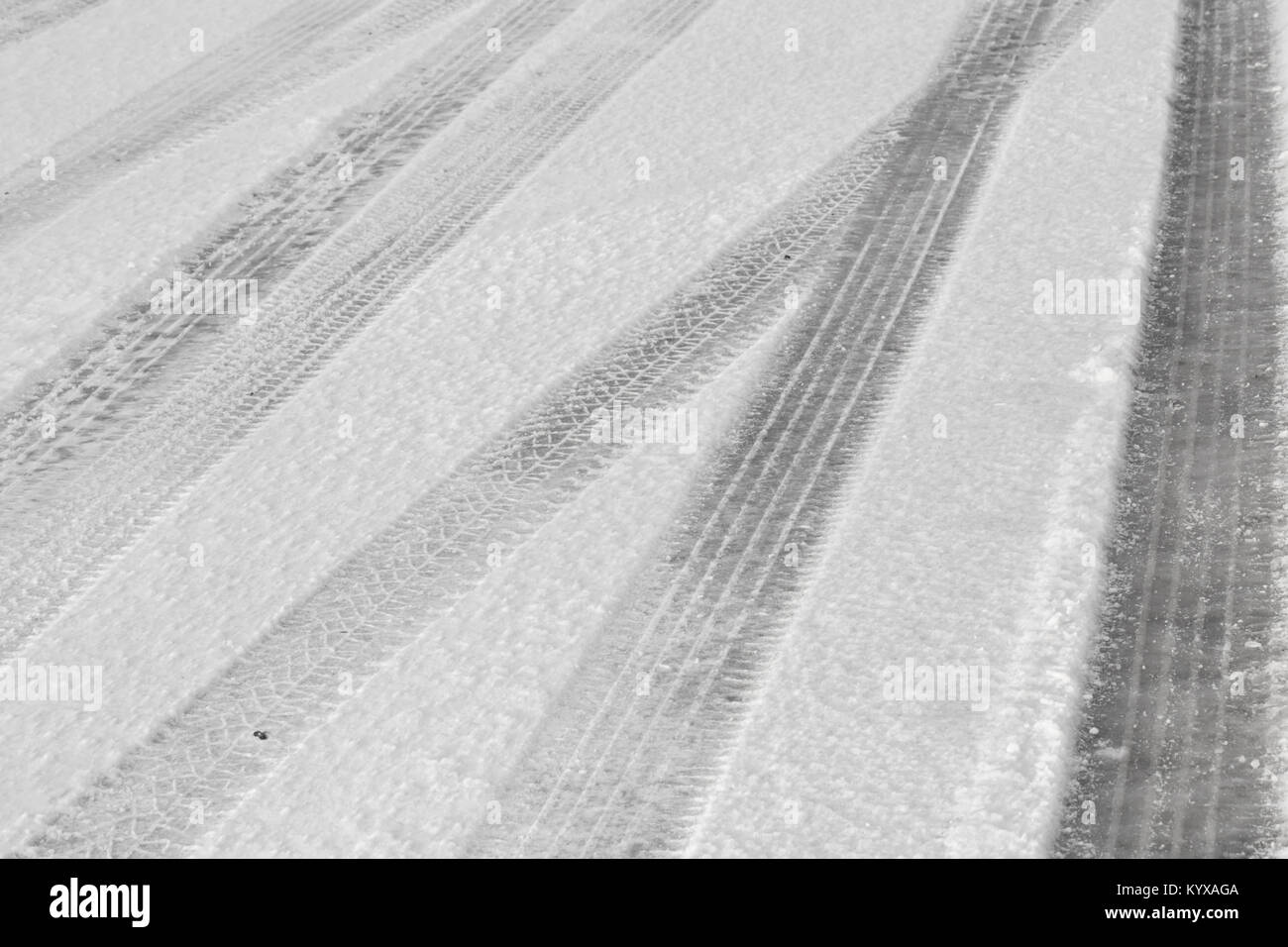 Tyre marks in snow Stock Photo - Alamy