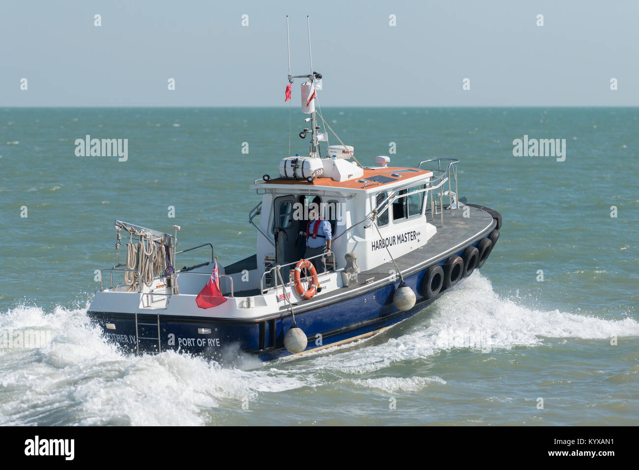 Rye Harbour, Harbour Masters boat heading out Stock Photo - Alamy