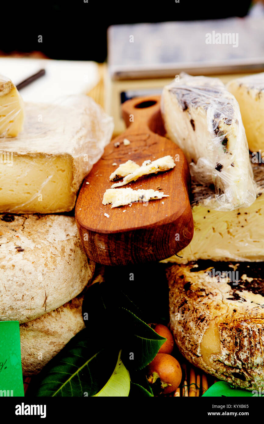Fresh Italian cheese ready for tasting in street market in Piedmont ...