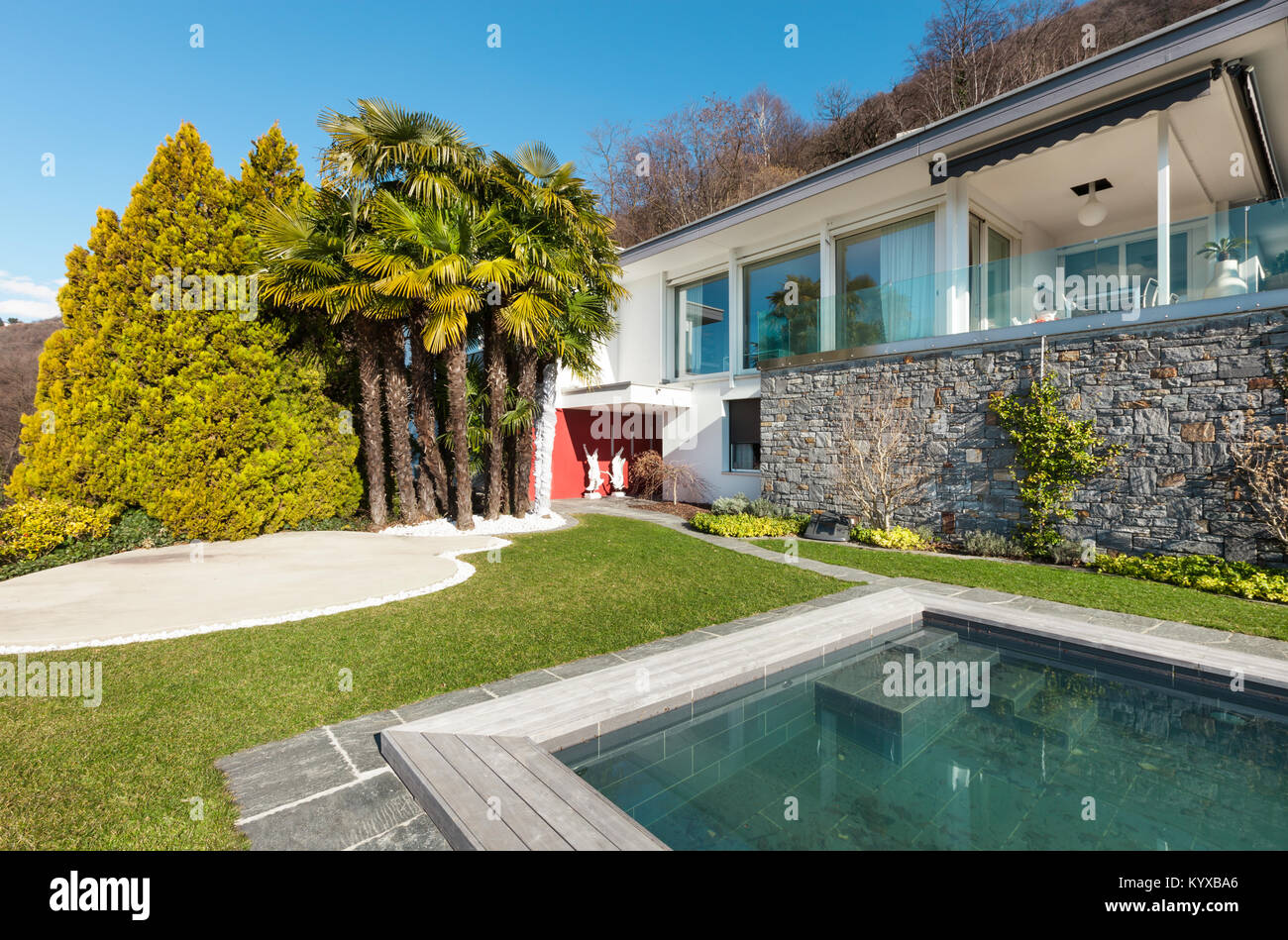 Modern house with swimming pool, view outdoor Stock Photo - Alamy