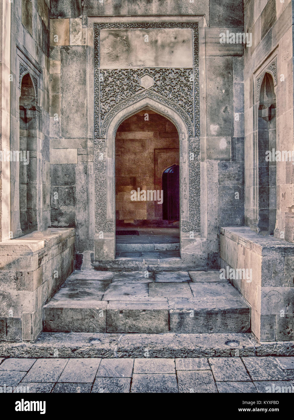 Asian style ancient archway in Baku old town Stock Photo - Alamy