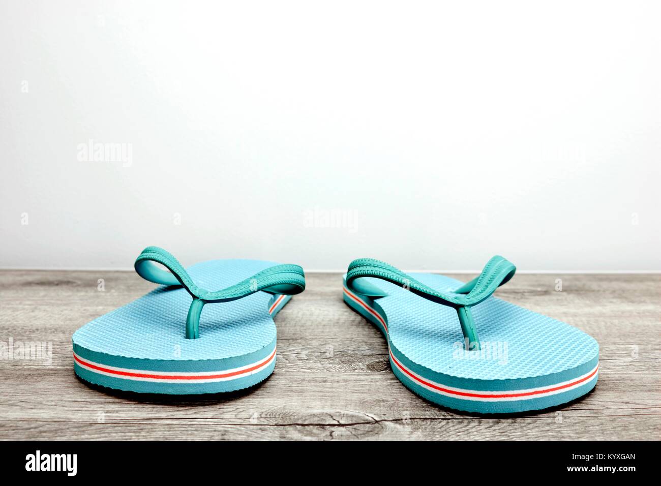 A studio photo of blue flip flops Stock Photo - Alamy