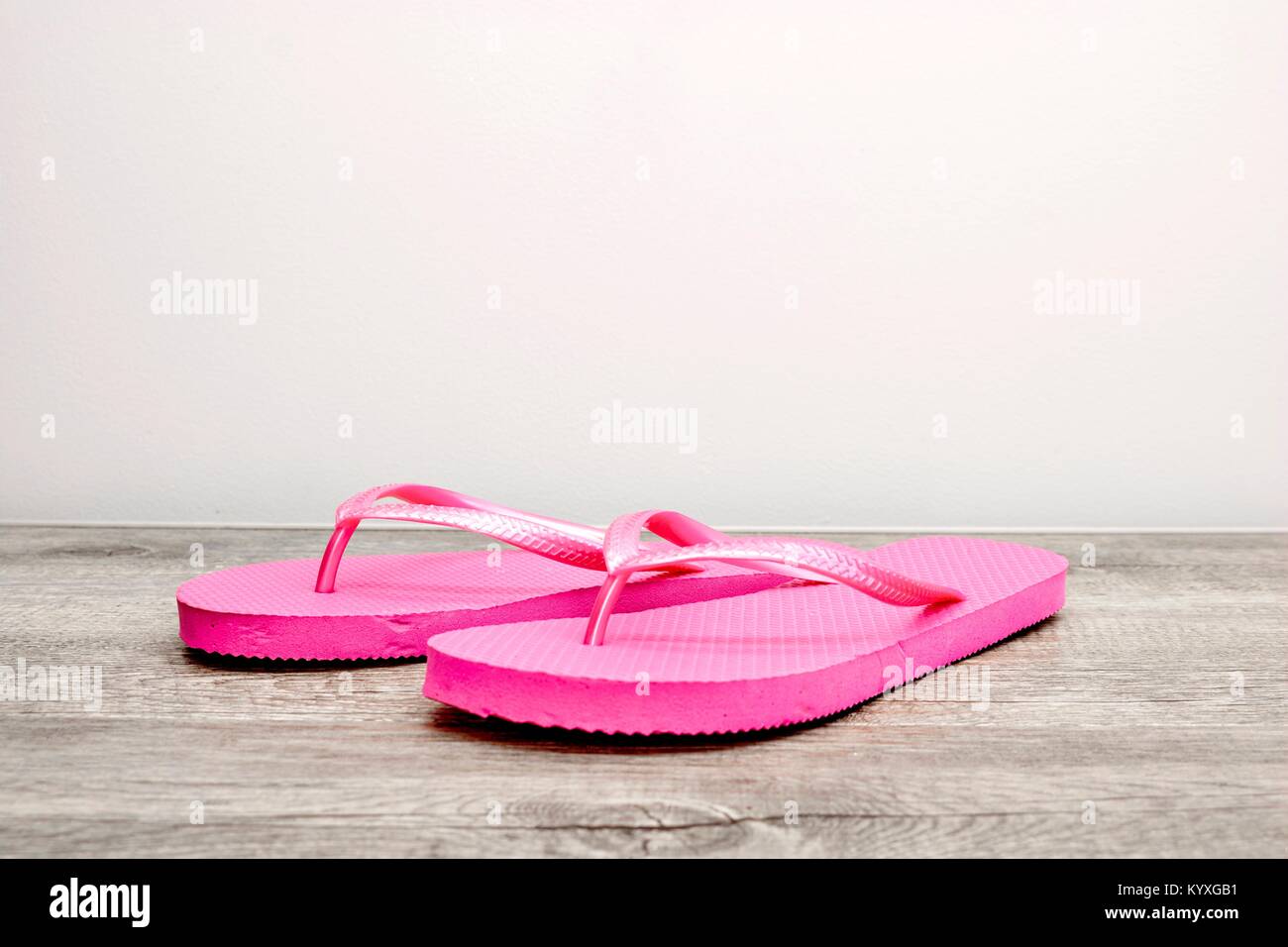A studio photo of pink flip flops Stock Photo - Alamy