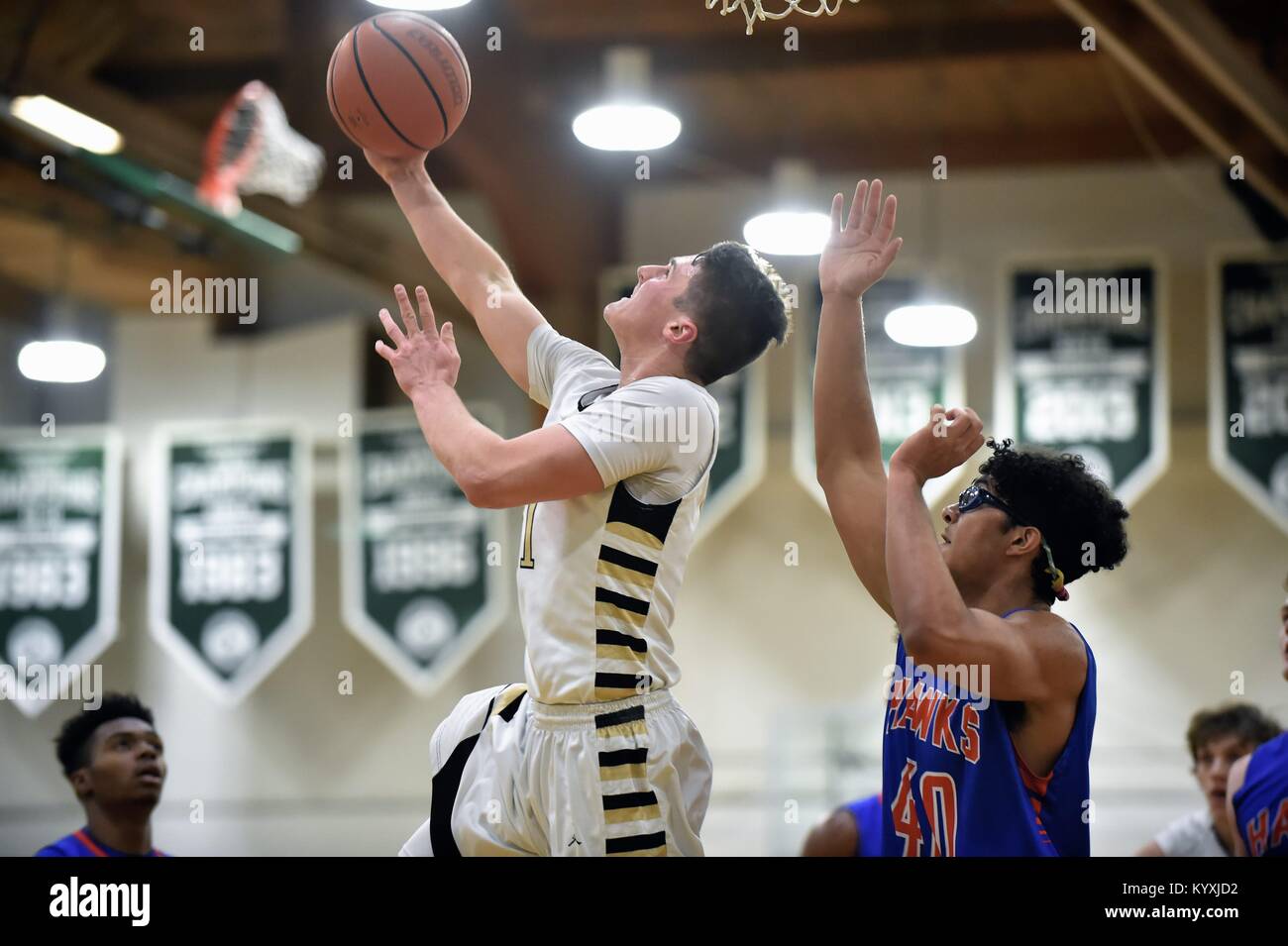 Player attempting to successfully complete a reverse layup after ...