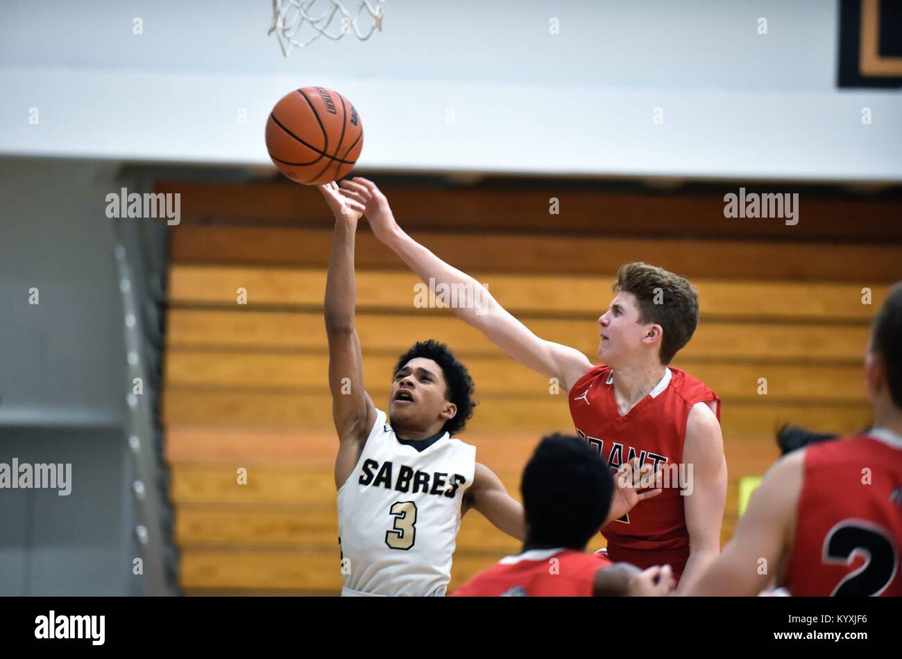 While enduring a significant height disadvantage, a guard took on a 6 ...