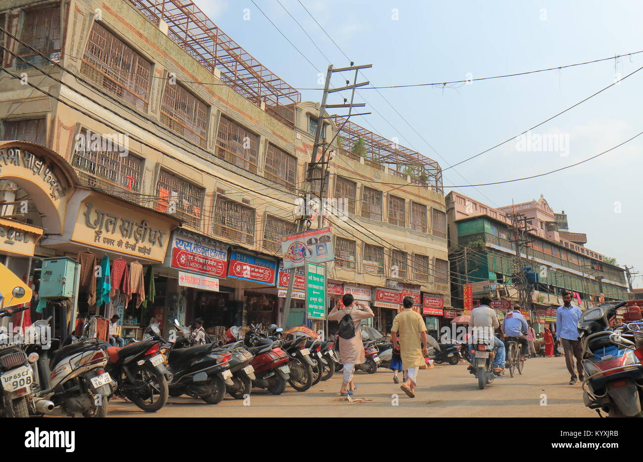 People visit old town shopping street in Varanasi India Stock Photo - Alamy