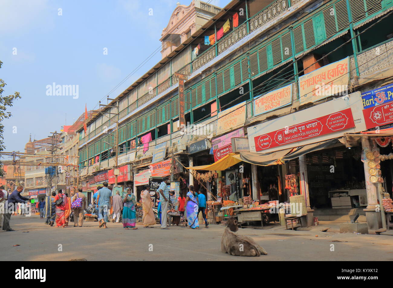 People visit old town shopping street in Varanasi India Stock Photo - Alamy