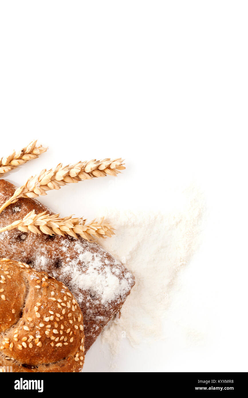 Tasty Wheat Bun with flour and ears. Flat lay isolated on white ...