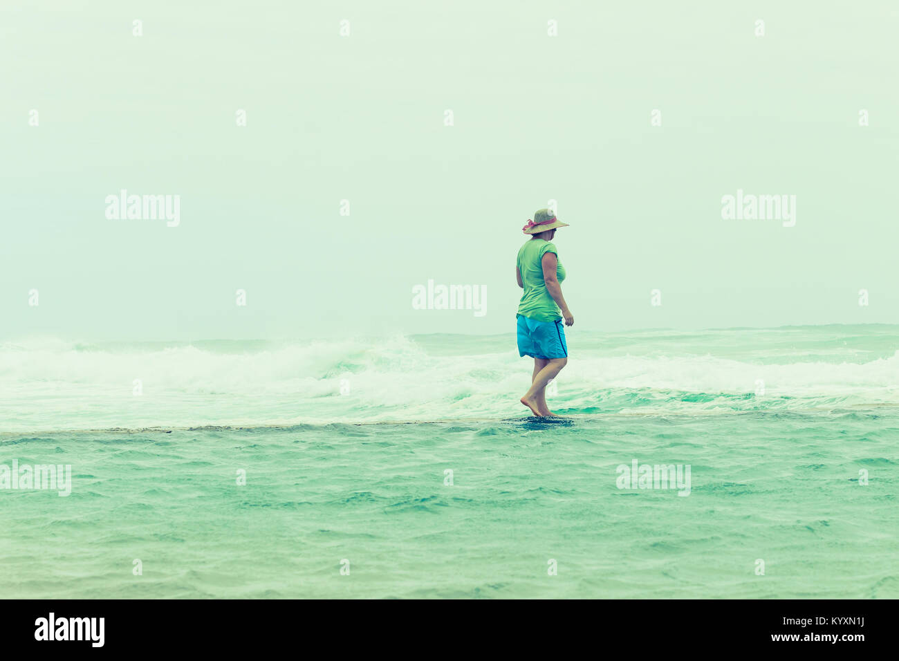 Man watching action of the waves hi-res stock photography and images ...