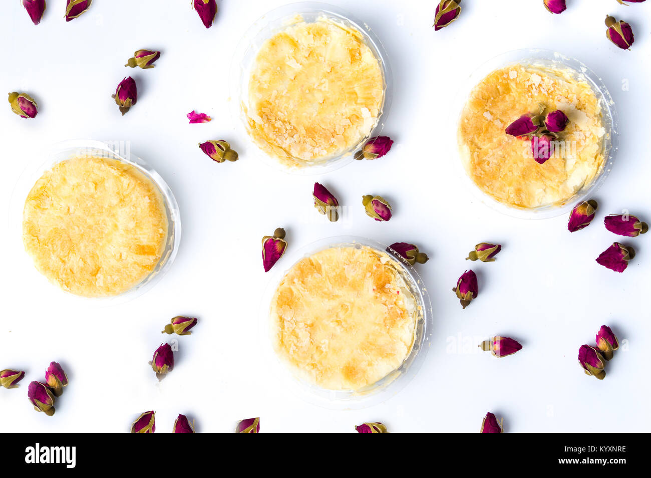 Rose pastry with natural flowers tea on white background Stock Photo ...