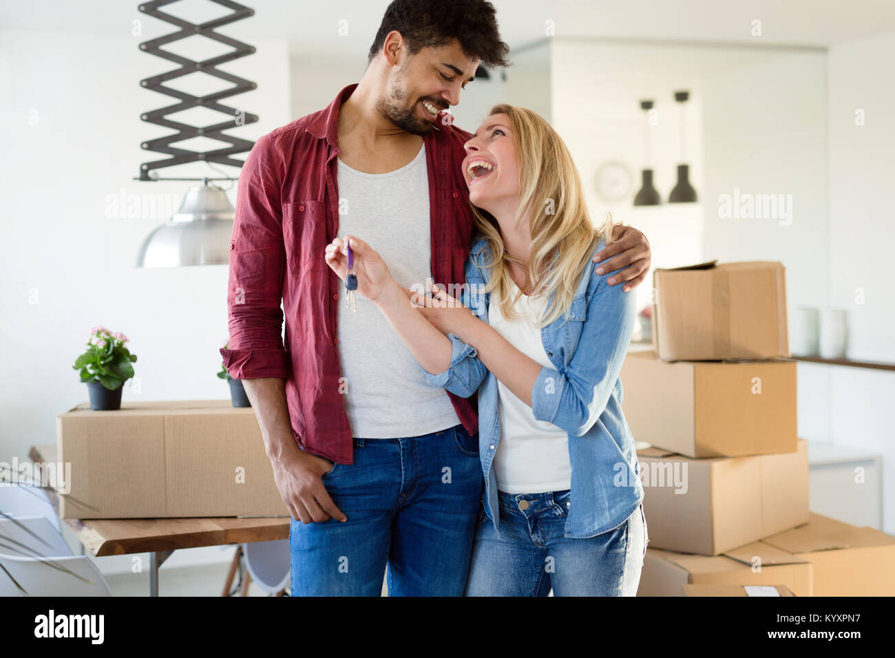 home, people, moving and real estate concept - happy couple having fun ...