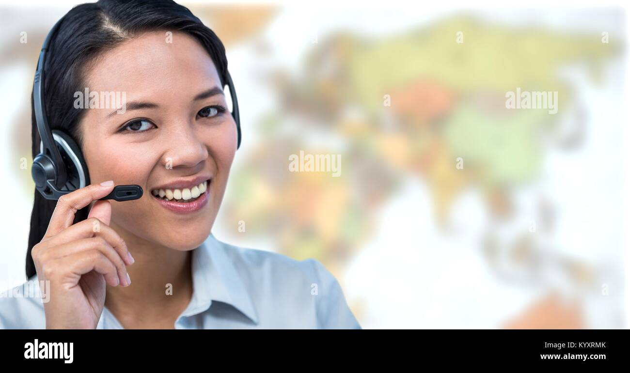 Travel agent woman wearing headset in front of world map Stock Photo ...