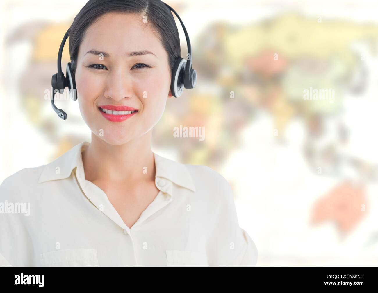 Travel agent woman wearing headset in front of world map Stock Photo - Alamy